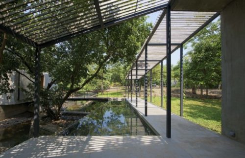 Architects Build Sustainable House With a Stream Running Through It